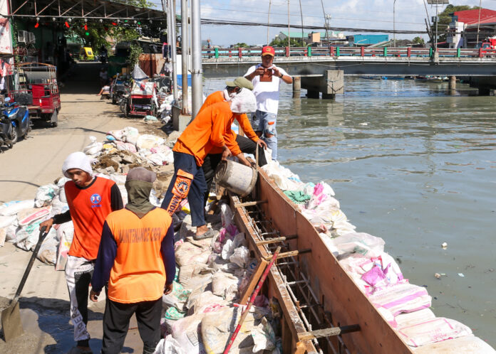DPWH to file charges vs contractor after seawall collapse in Navotas ...